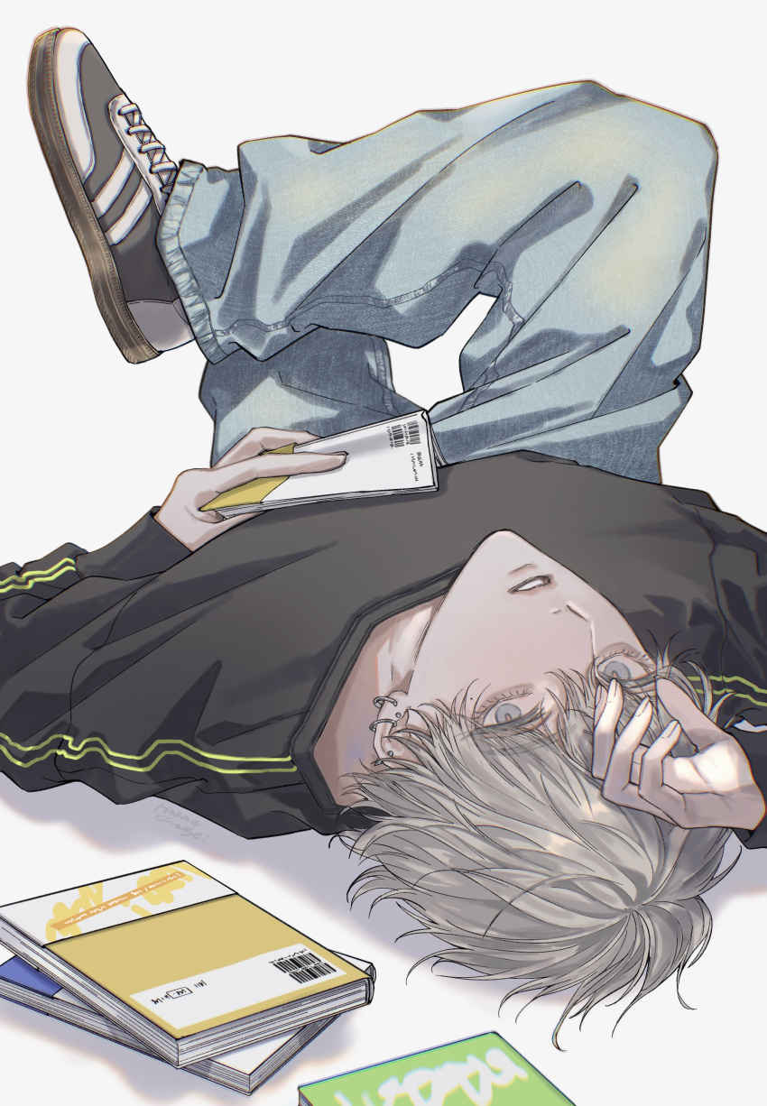 Safebooru - 1boy absurdres black shirt blonde hair blue eyes book denim highres jeans lying male ...